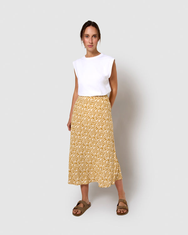 Falda midi bambula detalles plisados telma ocre – Tramas+